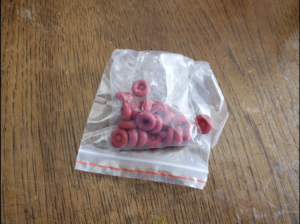 Red cap fuel bladders | J&H Aerospace